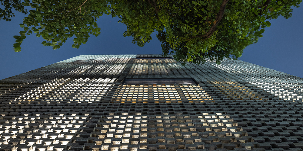 Architects Collaborative designs a modern brick house using a ...