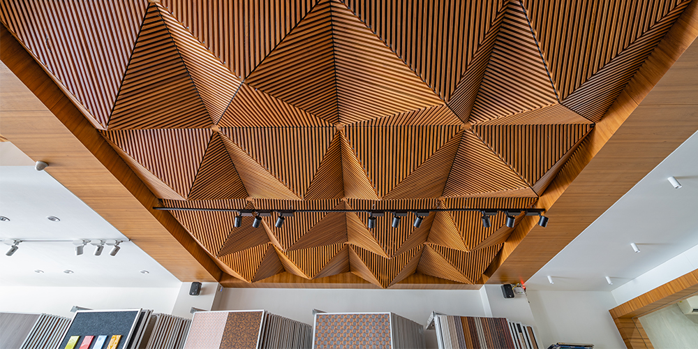 This veneer showroom planned by Marigold Interiors uses wood in ...