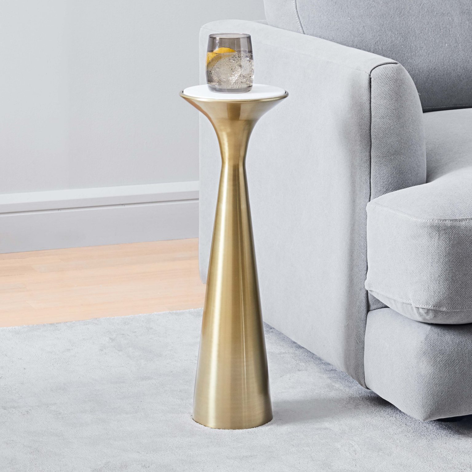 Silhouette Pedestal Drink Table - Elle Decor